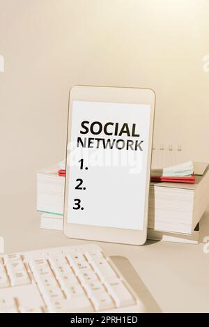 Hand writing sign Social NetworkInteractions Sharing Information ...