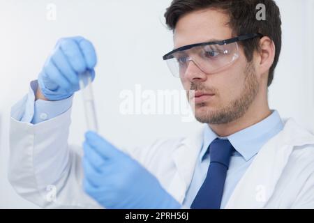 Identifying microorganisms that are causing infection. a young male ...