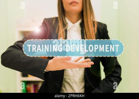 Hand writing sign Training Development, Business approach Learn and ...