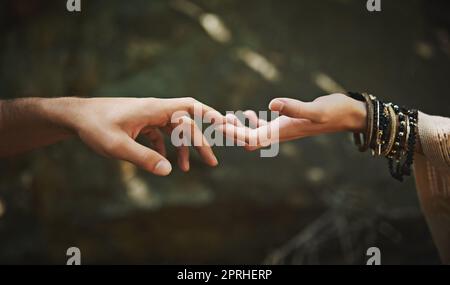 The power of touch. a couple touching each others fingers Stock Photo ...