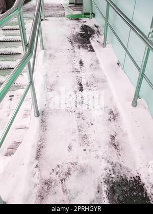 Outdoor stairs with ramp and metal railings Stock Photo - Alamy