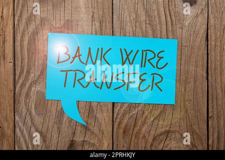 Text sign showing Bank Wire TransferElectronic transfer of money ...