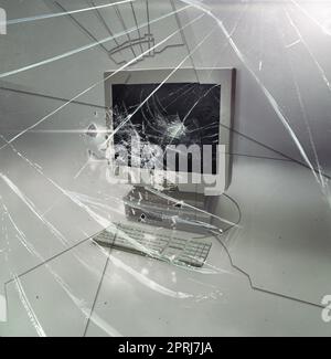 Everything is falling apart. a desktop computer smoking after burning ...