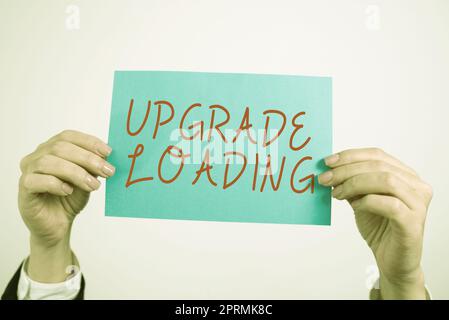 Text sign showing Upgrade Loading. Business photo text advancement of applications to more ...