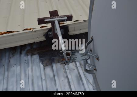 Installation and configuration of a satellite television a dish Stock ...