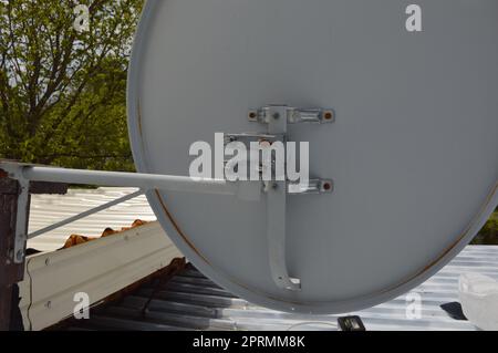Installation and configuration of a satellite television a dish Stock ...