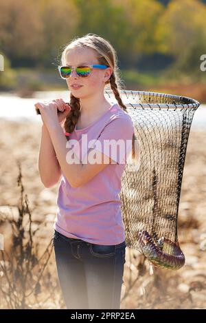Girl with fishing net Stock Photo - Alamy
