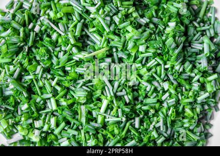 Fresh cut chives closeup view. Food background Stock Photo - Alamy