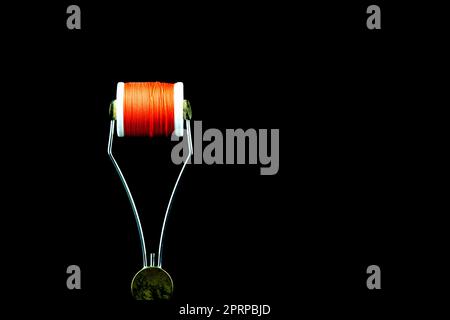 Fishing fly tying bobbin tool with thread and fly tying vice in ...