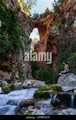God's Bridge, hiker, Akchour, Talassemtane Nature Park, Rif region ...