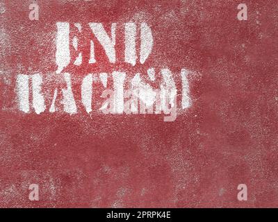 End racism message on wall. END RACISM on red wall. Ideal for concepts ...