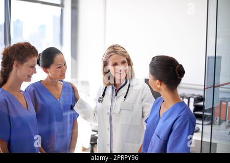 Mutual respect makes for a great team. a female doctor talking to a ...