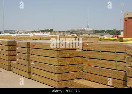 Stacks of timber at Shoreham Port Stock Photo - Alamy