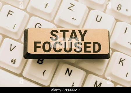 Conceptual caption Stay Focused. Business showcase Be attentive Concentrate Prioritize the task ...