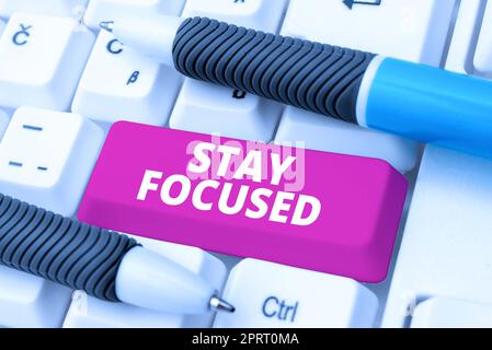 Hand writing sign Stay Focused. Word Written on Be attentive Concentrate Prioritize the task ...