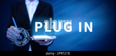 Hand writing sign Plug In. Word for putting device into electricity to ...