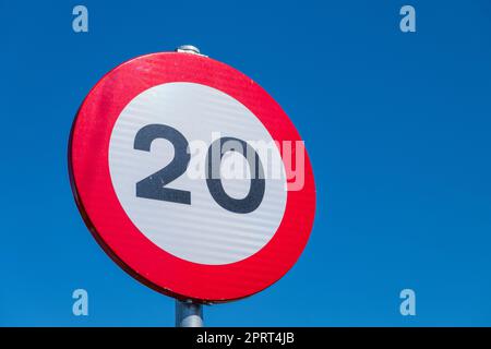 20 kilometers per hour speed limit sign on the street 20 kilometers per ...