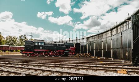Old german railway roundhouse in Gniezno, Poland. Ruins, rust and decay ...