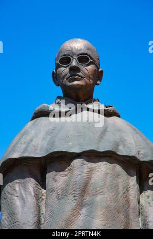 a roman catholic priest, a religious leader in christian religion roman ...