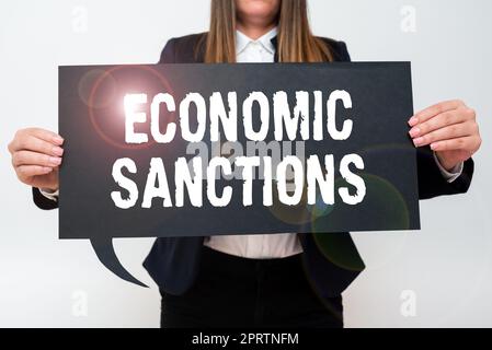 Sign displaying Economic SanctionsPenalty Punishment levied on another ...