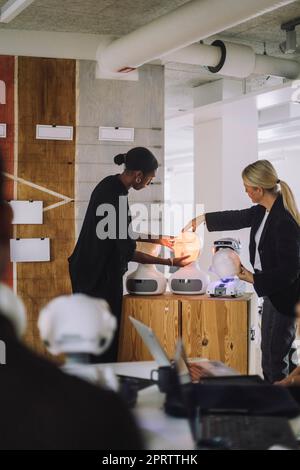 Female Teacher Discussing Topic with Student Stock Photo - Alamy