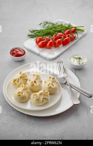 Uzbek manty with meat of a lamb Stock Photo - Alamy