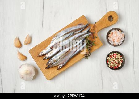 Top view of resh raw frozen capelin Stock Photo - Alamy
