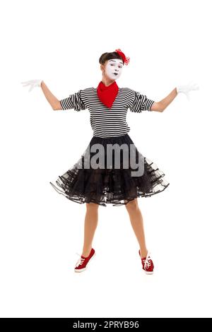 Full length portrait of mime woman artist jumping isolated on white ...