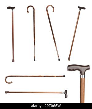 Set with elegant wooden walking canes on white background Stock Photo ...