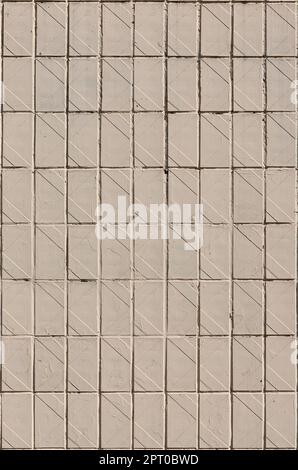 Old Soviet beige wall tiles. The texture of the classical outer tile ...