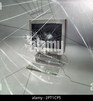 Everything is falling apart. a desktop computer smoking after burning ...