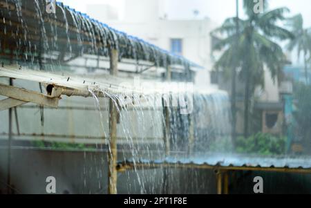 Rain on a Tin Roof. Rain Falling from the Roof. Rainy day nature ...