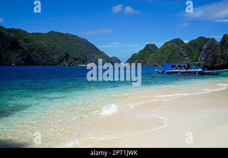 wooden traditional outrigger boats on palawan island at the philippines ...