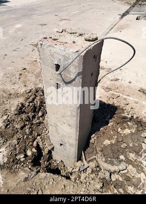 Stacked concrete electric pole on the ground prepare to use Stock Photo ...