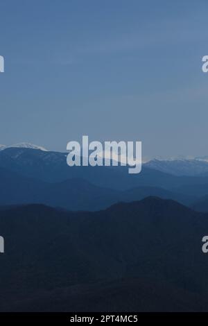 View of snowy peak of Mount Fisht from afar. Main Caucasian ridge in ...