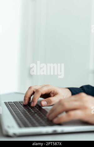 Businesswoman Typing Recent Updates On Lap Top Keyboard On Desk And ...
