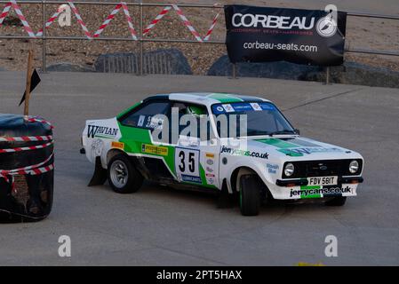 Simon Webster racing a Ford Escort RS1800 competing in the Corbeau ...