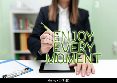 Text sign showing Enjoy Every Moment. Business photo showcasing stay ...