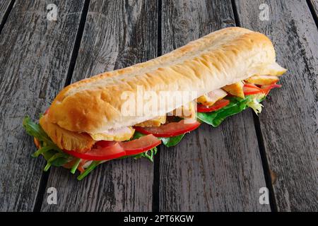 Simple sandwich with ham, tomato, arugula and soft cheese Stock Photo ...