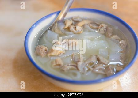 Pork intestine rice flat noodle in restaurant Stock Photo - Alamy