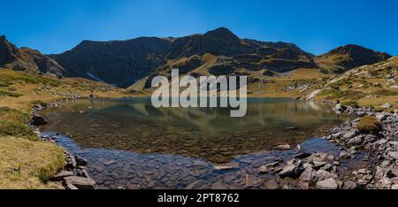 A panorama picture of the Rila National Park's Fish Lake Stock Photo ...