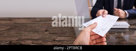 Employee Giving Payroll Cheque From Checkbook. Salary Check Stock Photo ...