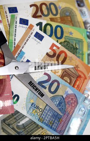 Die Schere zwischen arm und reich Stock Photo - Alamy