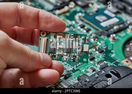 Repairing laptop, changing hardware parts Stock Photo - Alamy