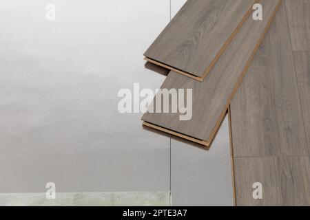 Installation of floating floor, underlay with sheets of laminate. Home ...