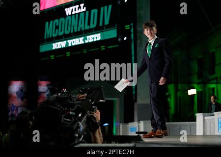 Cancer survivor Kyle Stickles, right, who is a Make-A-Wish kid, walks ...