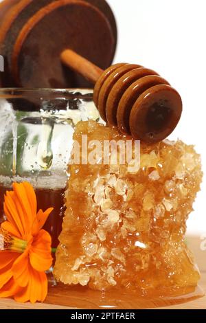 Fresh Local Honey With Orange Wildflowers on White Background Stock ...