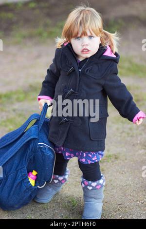 Outdoor portrait of 4 fashion kids playing together outside Stock Photo ...