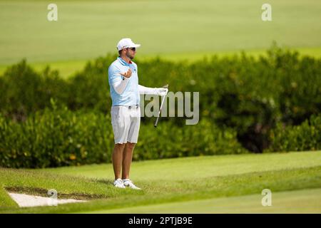Dean Burmester of Stinger GC reacts on the 18th green during the second ...