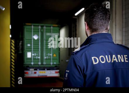 ROTTERDAM - A customs officer of the Port of Rotterdam Customs in a ...